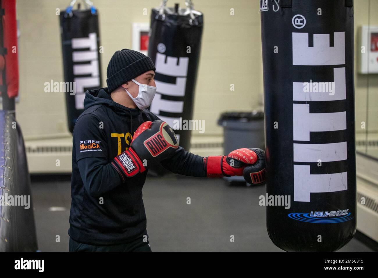 Spc. Jeremiah Perales, a boxing Soldier-athlete, demonstrates correct ...
