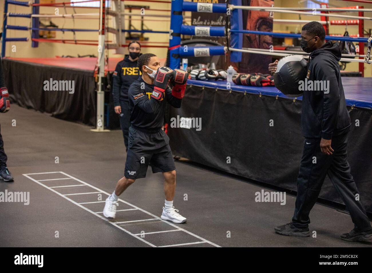 Pvt. 1st Class Eli Lankford demonstrates agility and strength in boxing ...