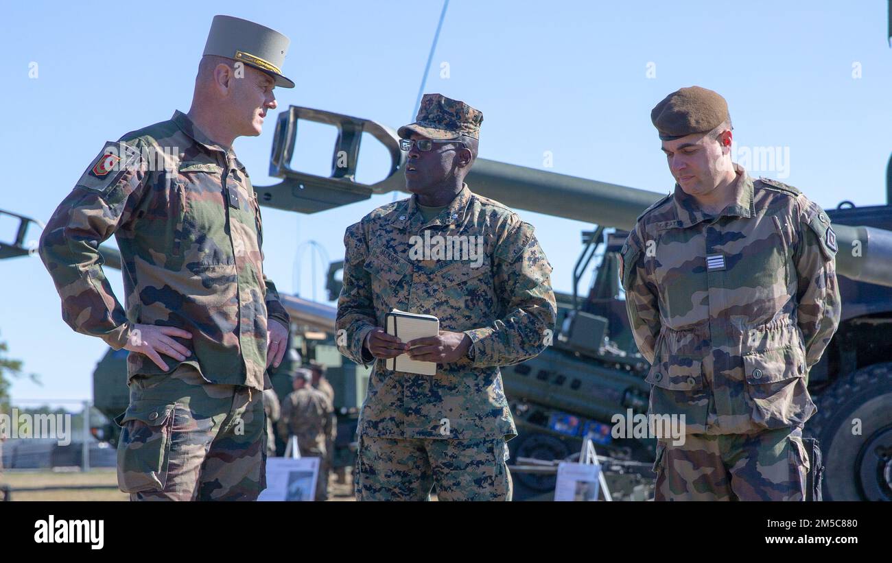 Lt. Col. Blake Jackson, middle, the operations officer for 1st ...