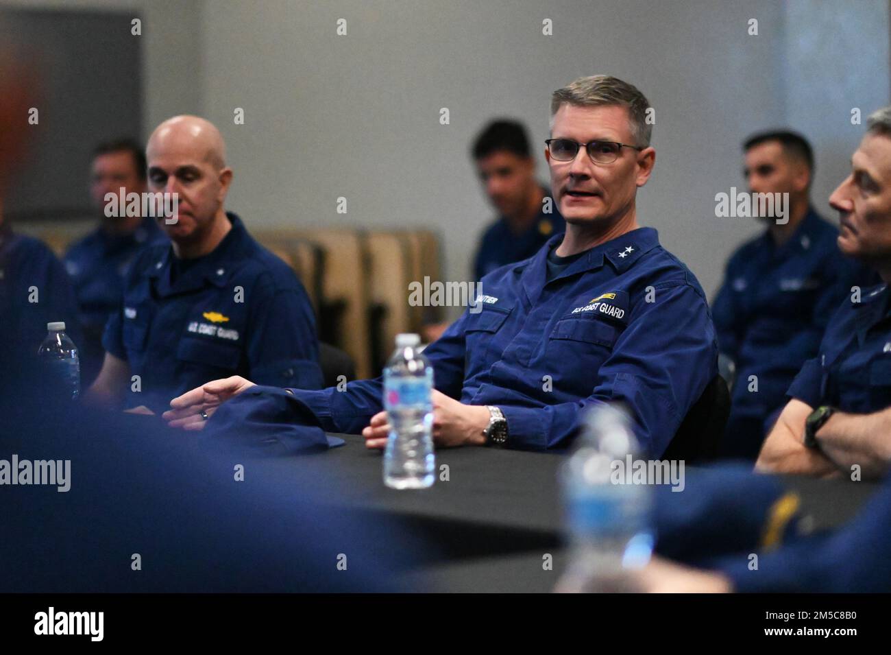 Rear Adm. Peter Gautier, Deputy Pacific Area Commander, talks to a room ...