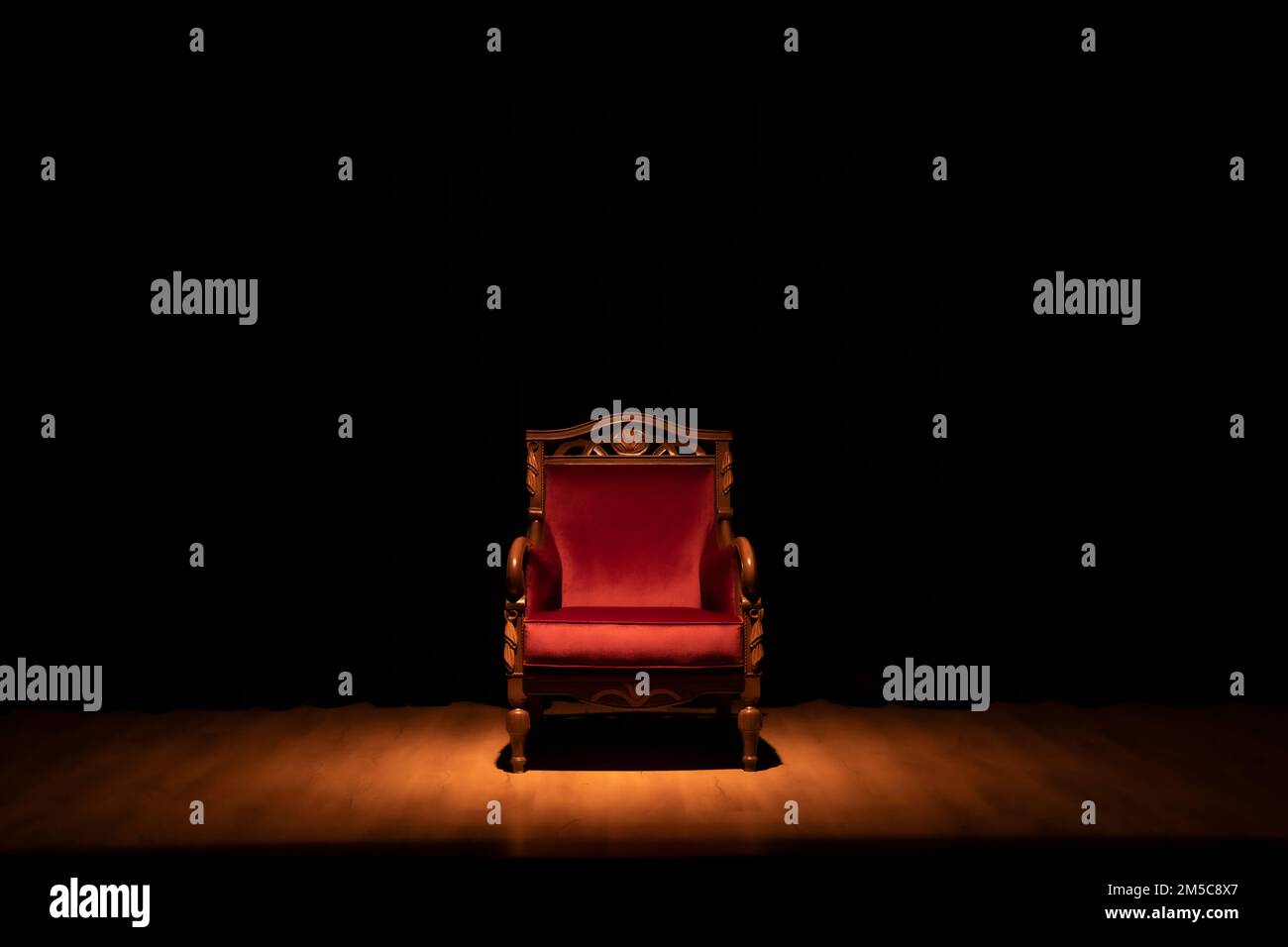 Red wooden seat on the theater stage Stock Photo - Alamy
