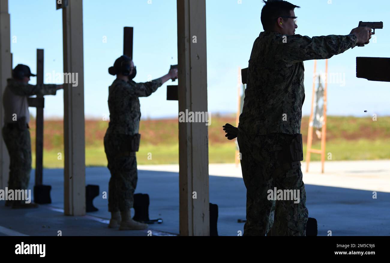 VQ-3 Detachment Sailors stationed at Travis Air Force Base fire the M18 ...