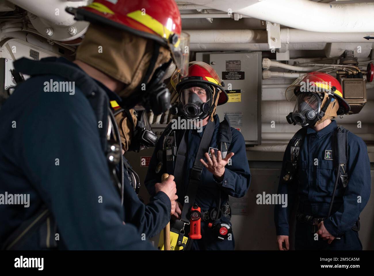 220228-N-XB010-1017 EAST CHINA SEA (Feb. 28, 2022) Damage Controlman ...