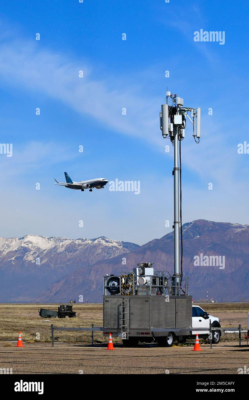 A 5G mobile test station is positioned on the edge of the runway while ...