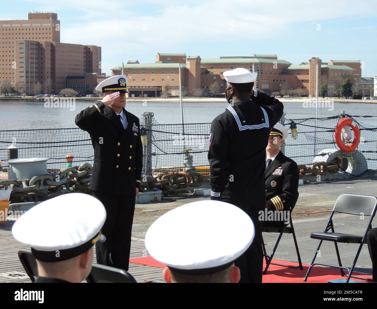Newly commissioned Chief Warrant Officer 2 Chris Harold renders his ...