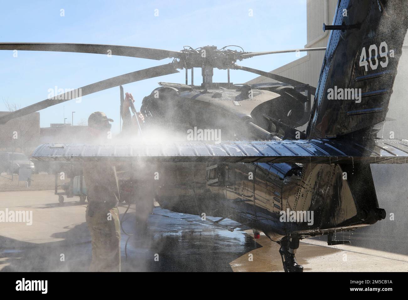 Nebraska Army National Guard Spc. Dylan Deboer, a helicopter mechanic ...