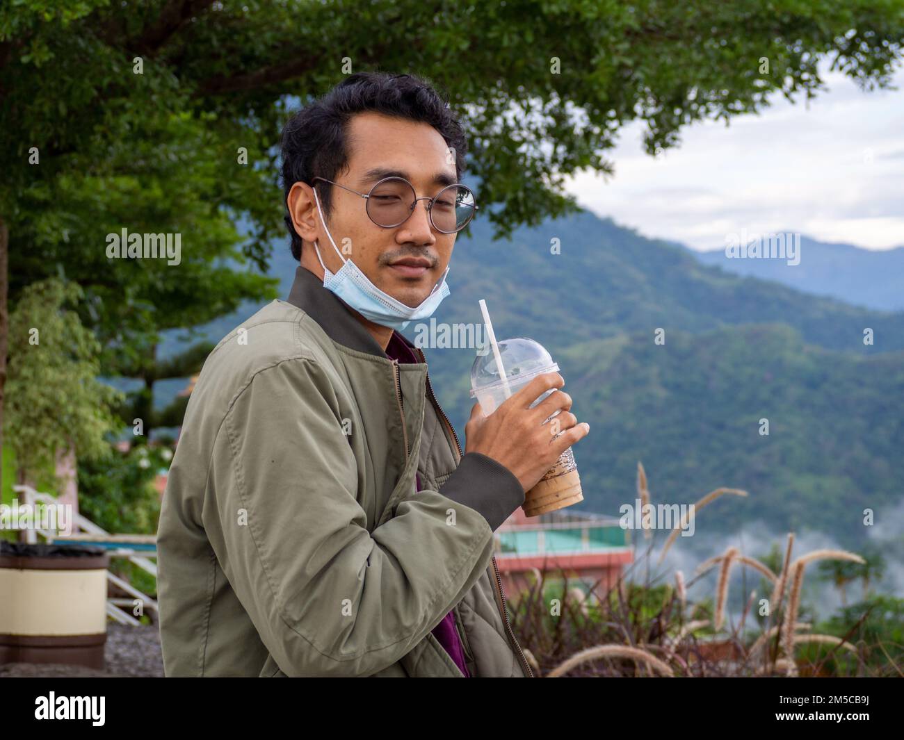 Asian man and mountain at Phetchabun, Thailand Stock Photo - Alamy