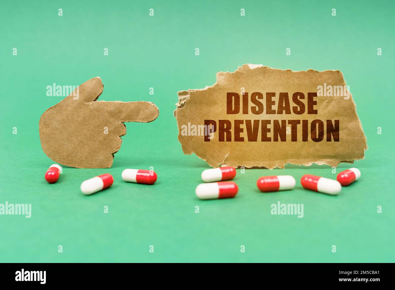 Medical concept. On the green surface of the tablet and a hand pointing ...
