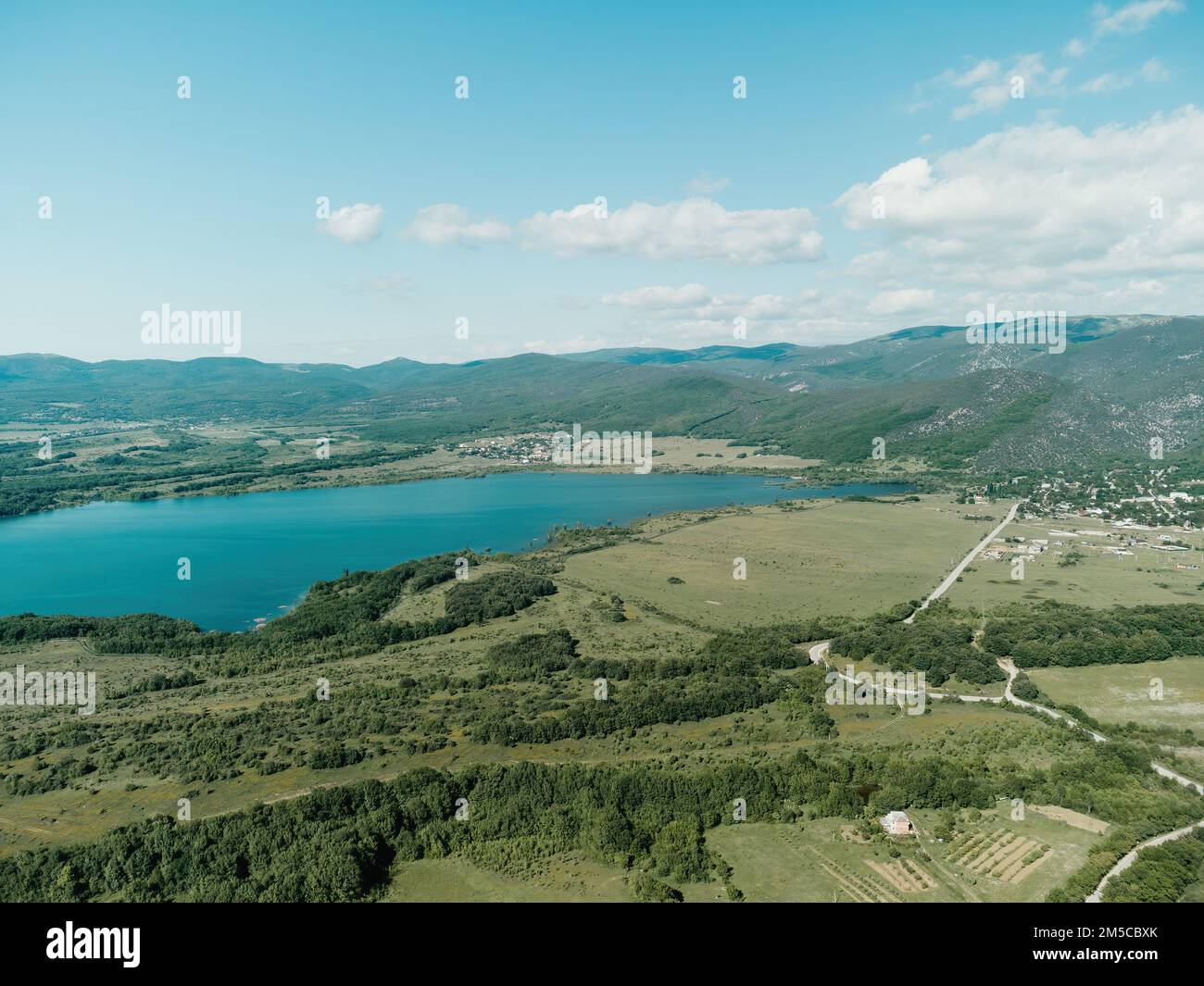 Aerial view on mountain lake. Drone over water reservoir at mountain ...