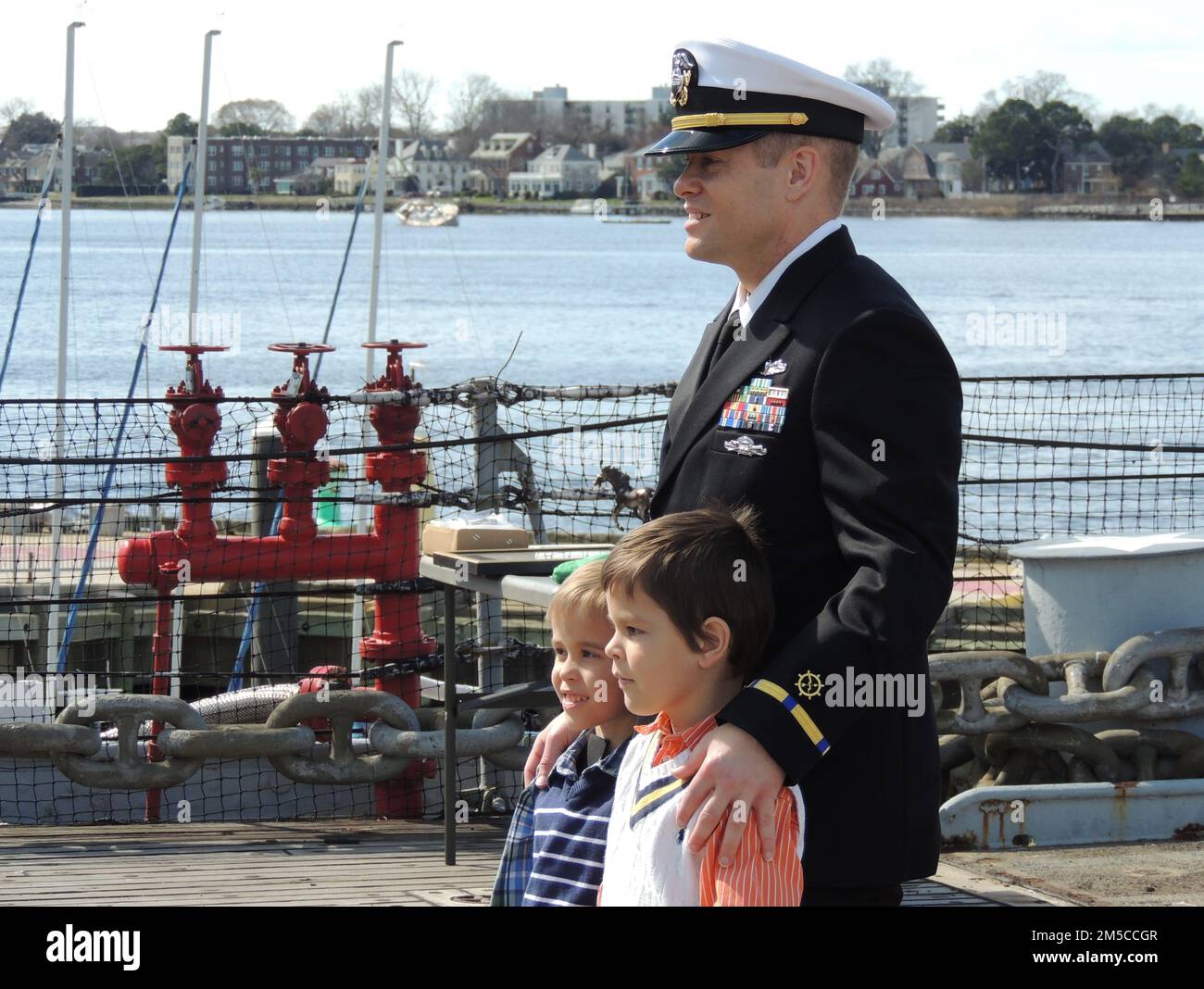OSCS Chris Harold, assigned to USS John C. Stennis (CVN-74), stands ...