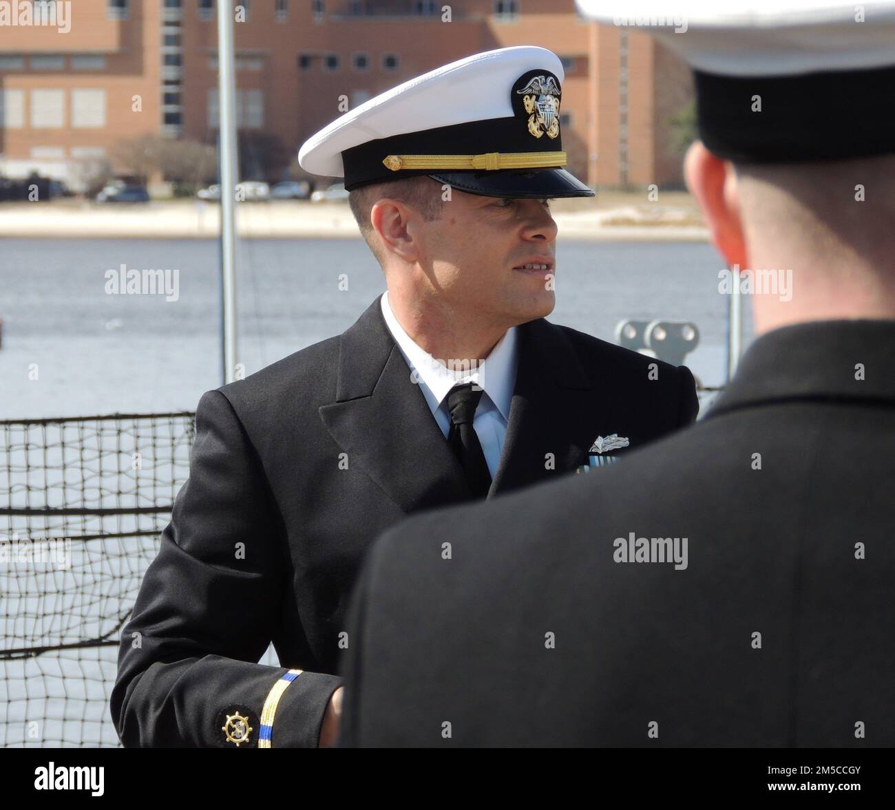 Newly commissioned Chief Warrant Officer 2 Chris Harold prepares to ...