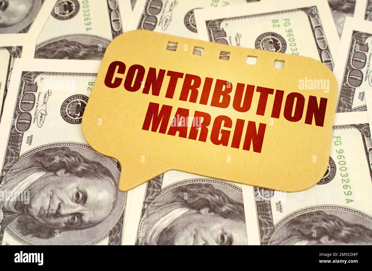 Business concept. On the dollars is a sign with the inscription ...