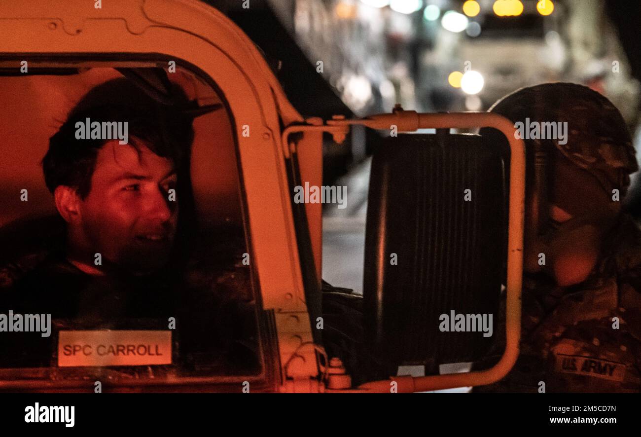 A U.S. Army soldier sits in the driver’s seat of a Humvee delivered for ...