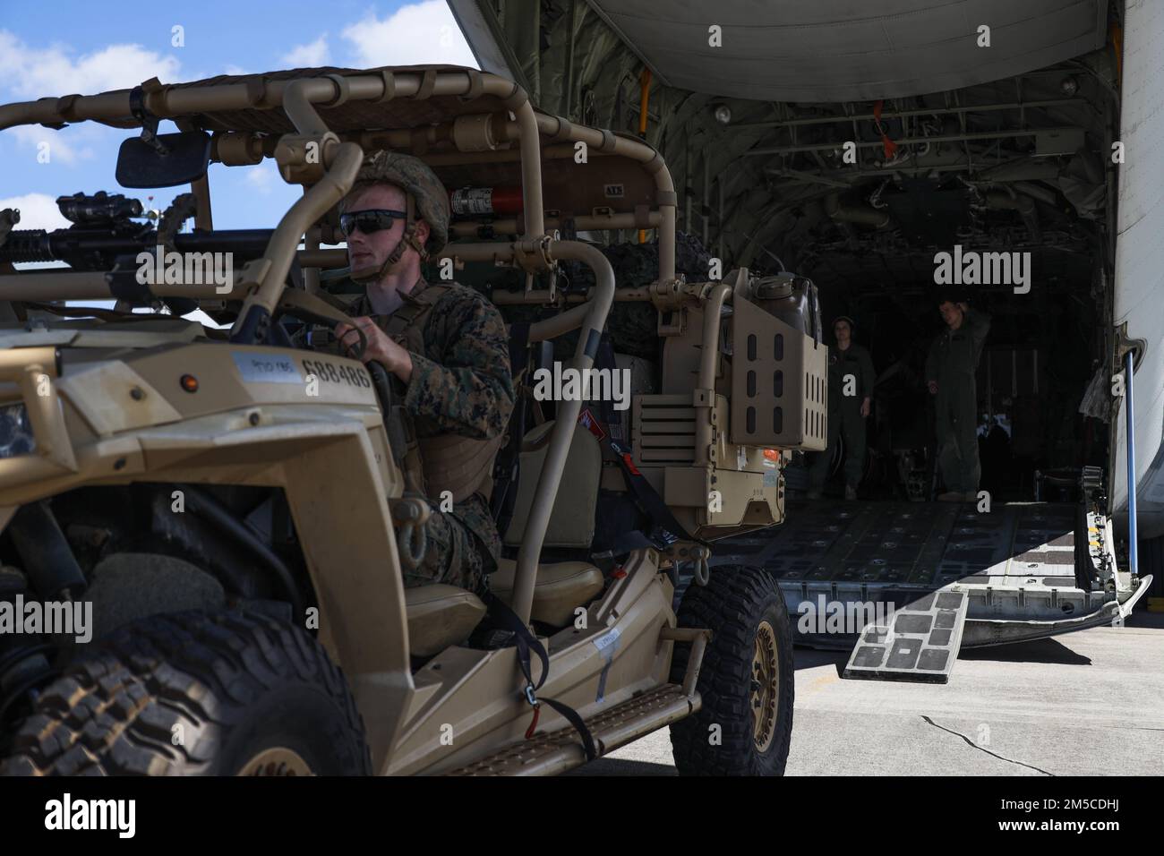U.S. Marines with 3d Reconnaissance Battalion, 3d Marine Division load ...