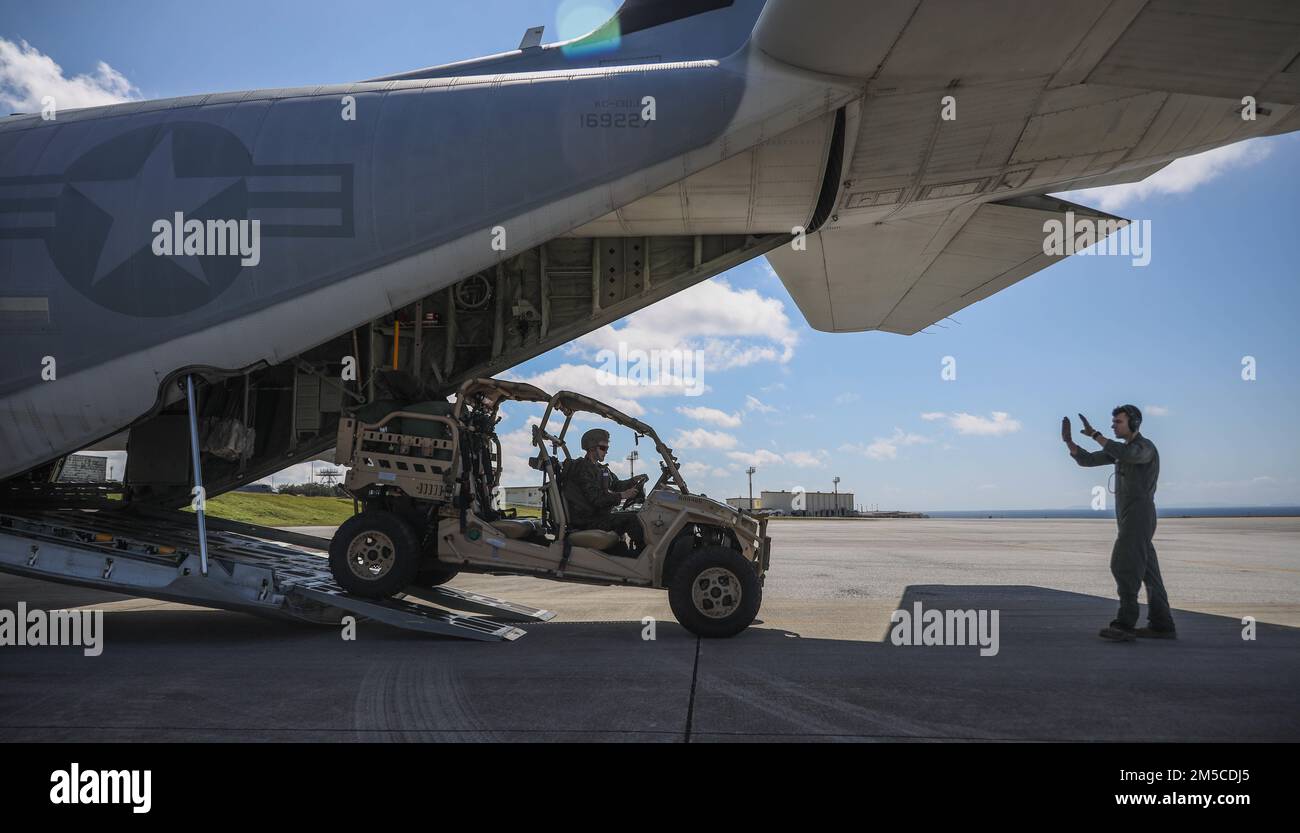 U.S. Marines with 3d Reconnaissance Battalion, 3d Marine Division load ...