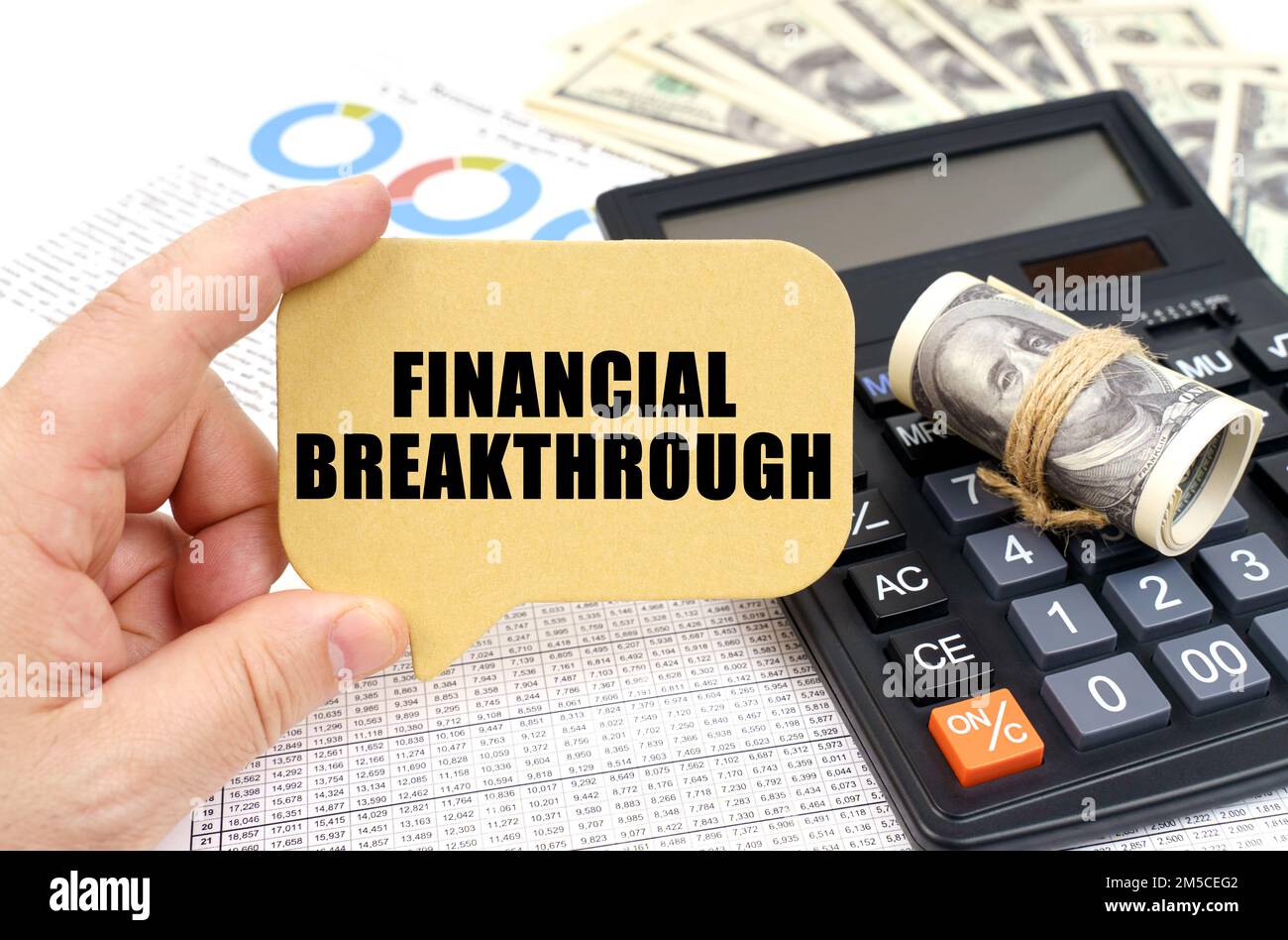 Business concept. Against the background of a calculator, documents and ...