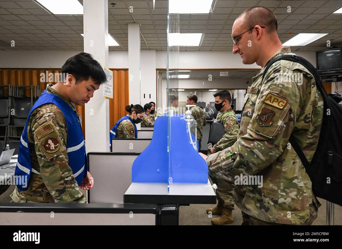 Airmen assigned to the 647th Air Base Group and 15th Wing process ...