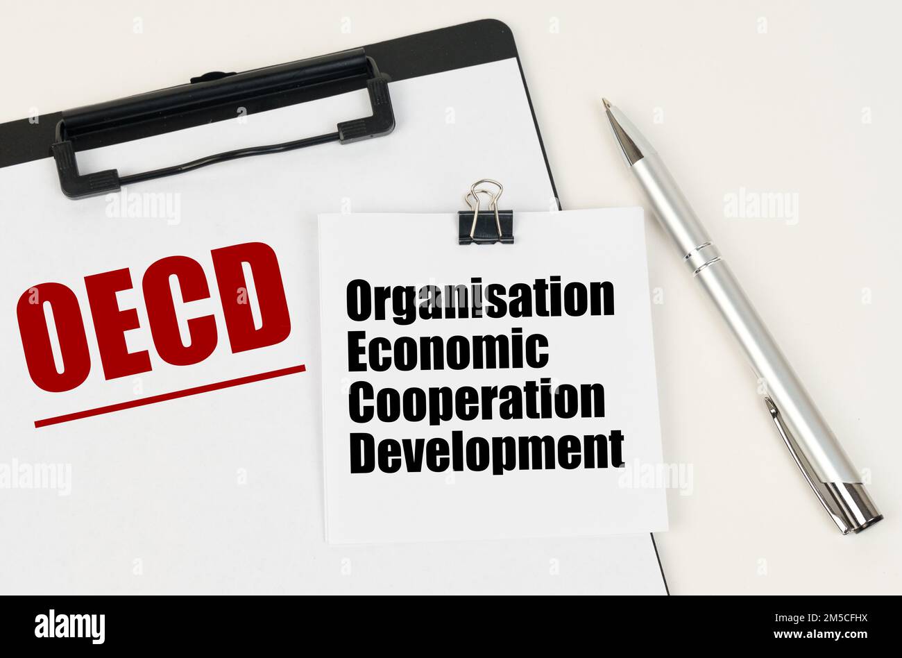 Business concept. On the tablet is a sheet of paper with the ...