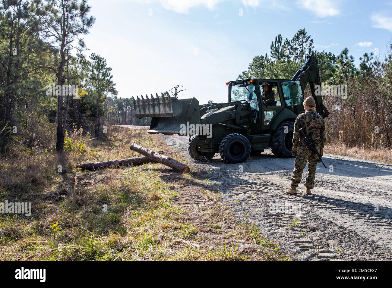 A U.S. Marine Lance Cpl. Garrett Brown, a Heavy Equipment Operator with ...