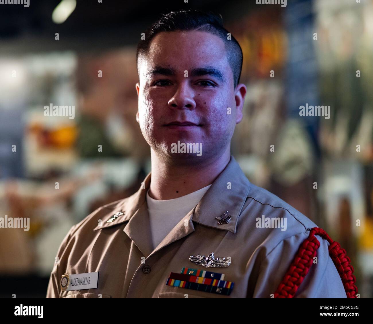 Fire Controlman 1st Class Juan Sebastian Valdezamarillas poses for a ...