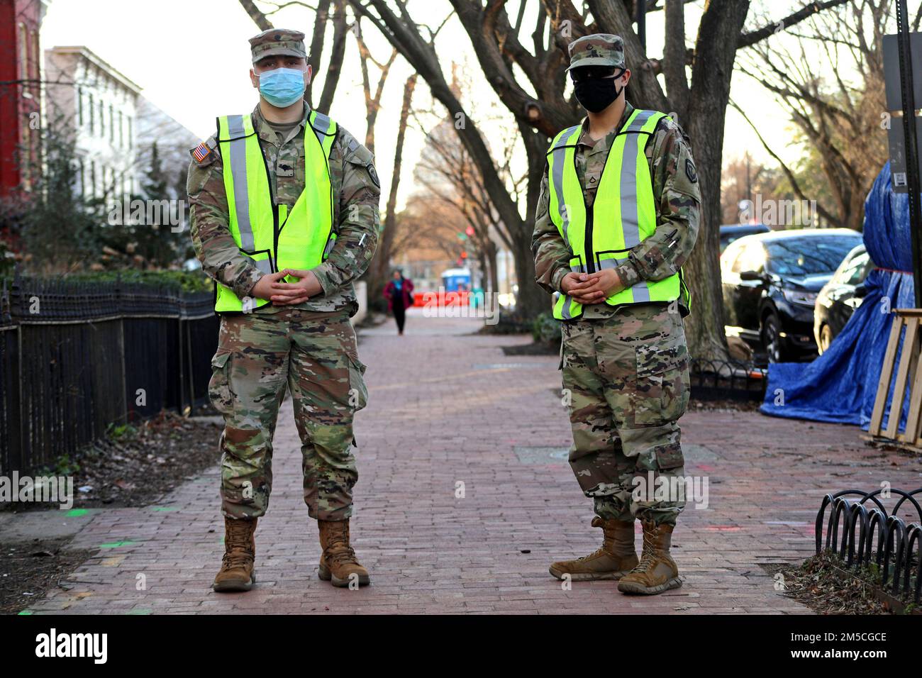 Spc. Mark Iglesias, 328th Military Police Company, and Pfc. Daniel ...