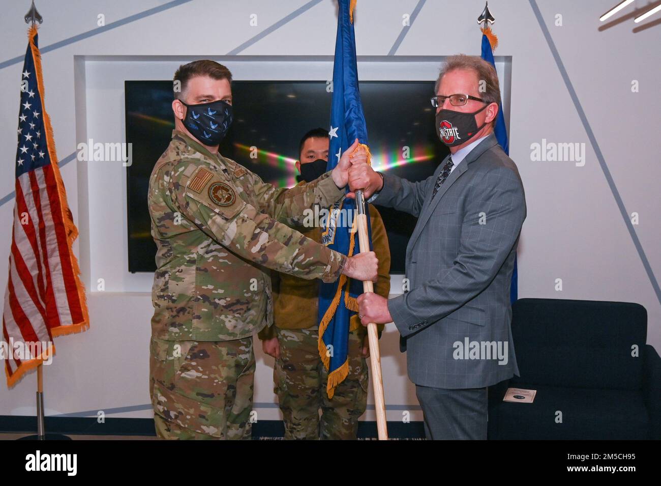 Stephen Bessette, right, assumes the position of lower civilian senior ...