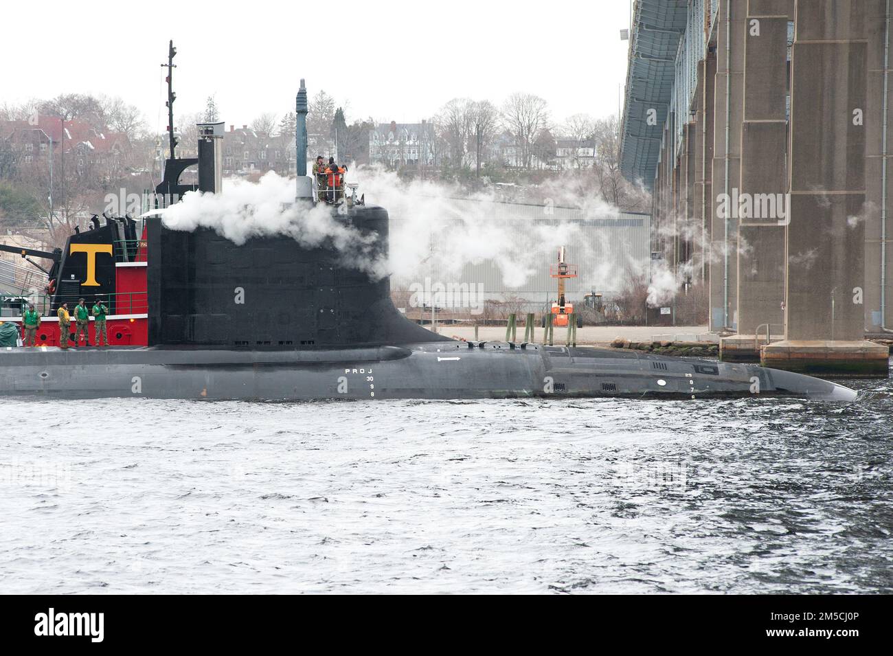 The future USS Oregon (SSN 793) makes its way under the Gold Star ...