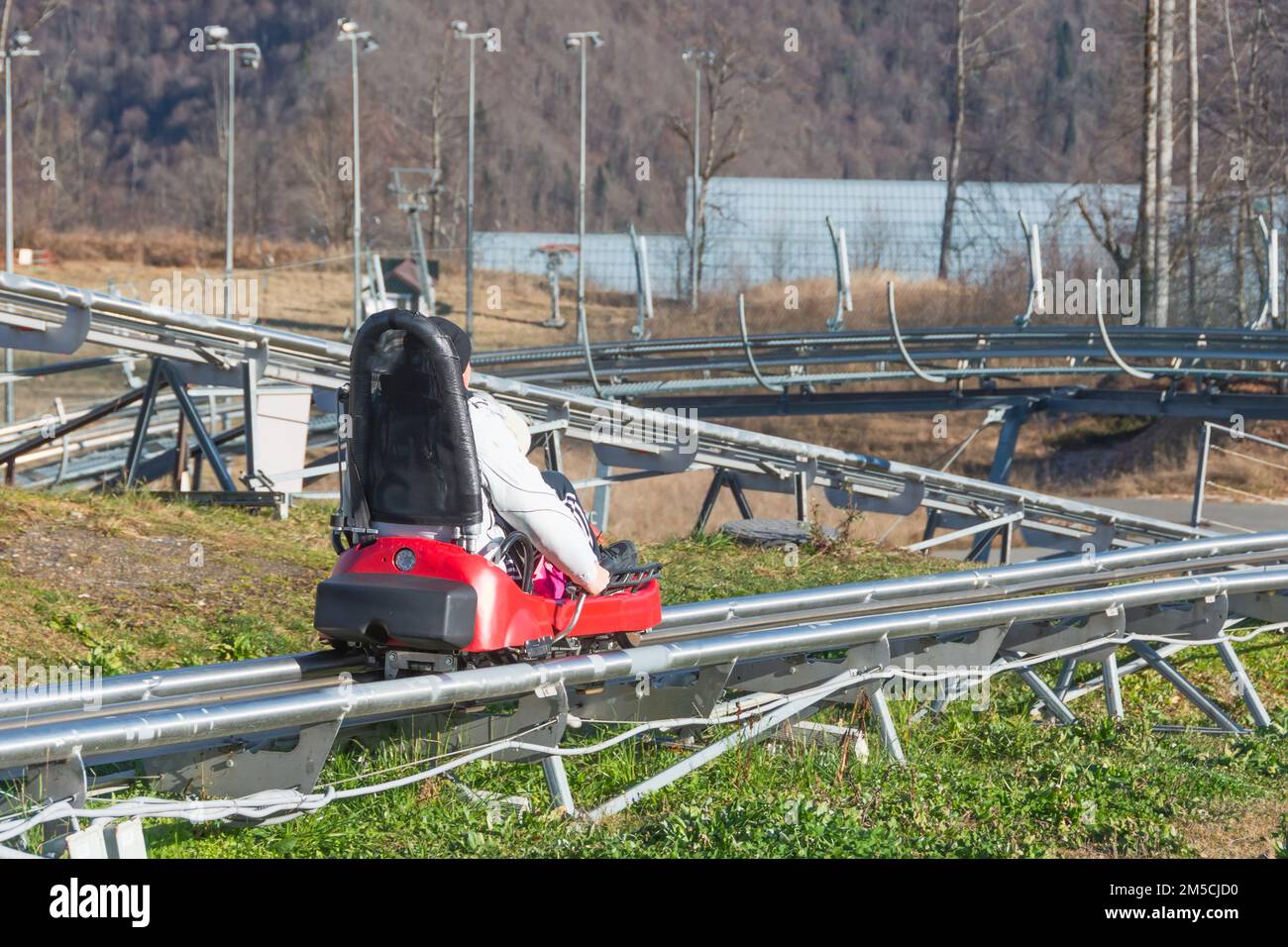Toboggan run on the rodelbahn with many turns on the mountain. Alpine ...