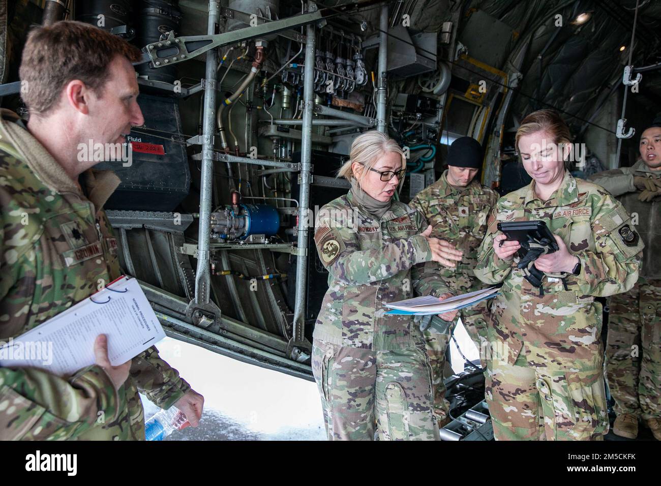 Critical care air transport team (CCATT) personnel brief the flight ...