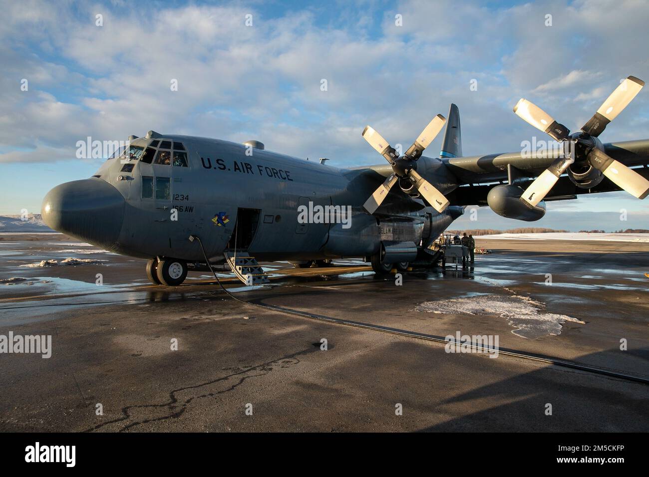 A Delaware Air National Guard C-130 prepares to transport a U.S. Air ...