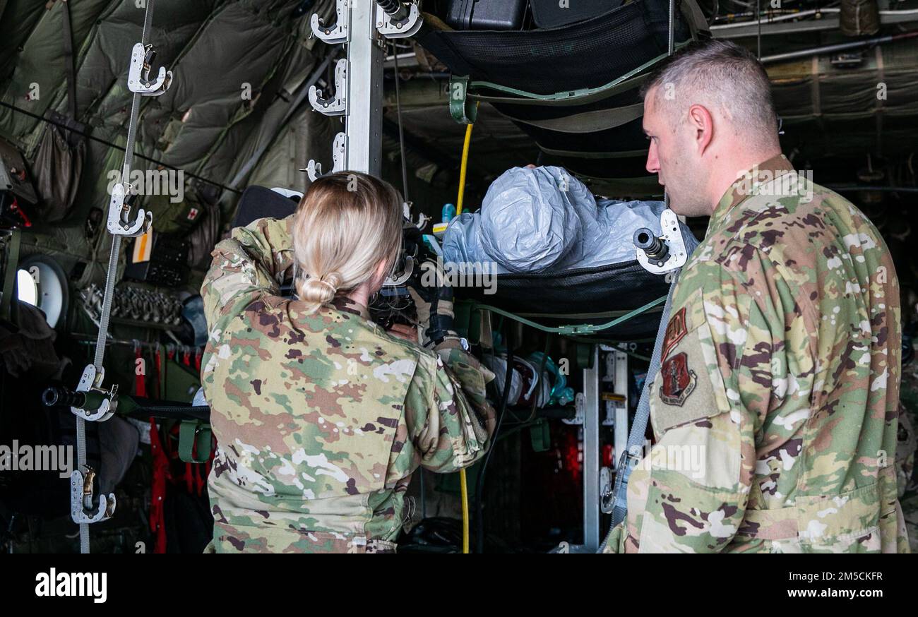 Critical care air transport team (CCATT) personnel load simulated ...