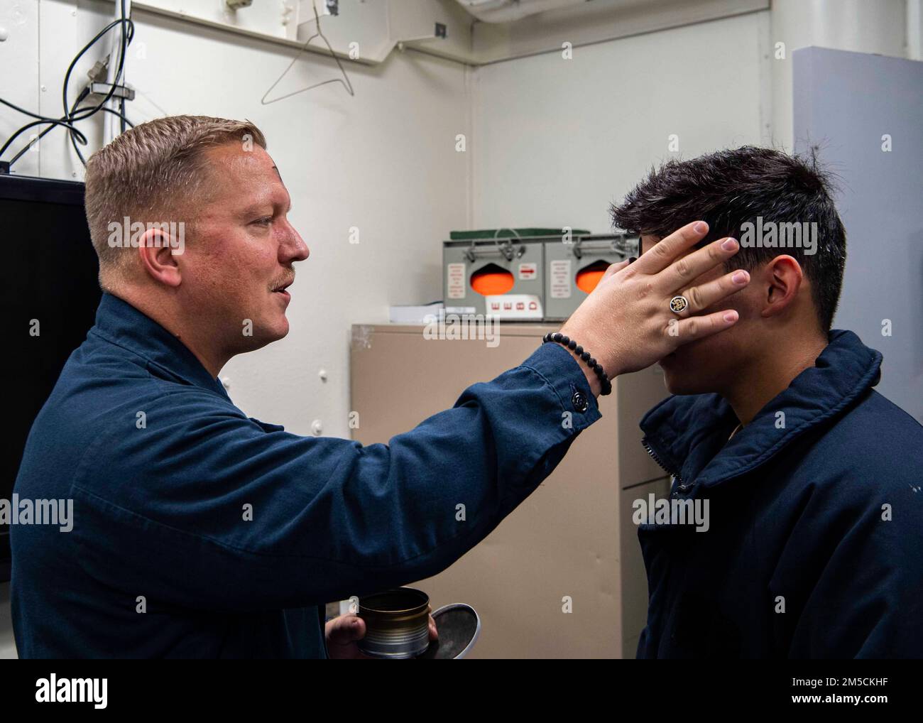 GULF OF OMAN (March 2, 2022) Lt. Ross Engel spreads ashes across the ...