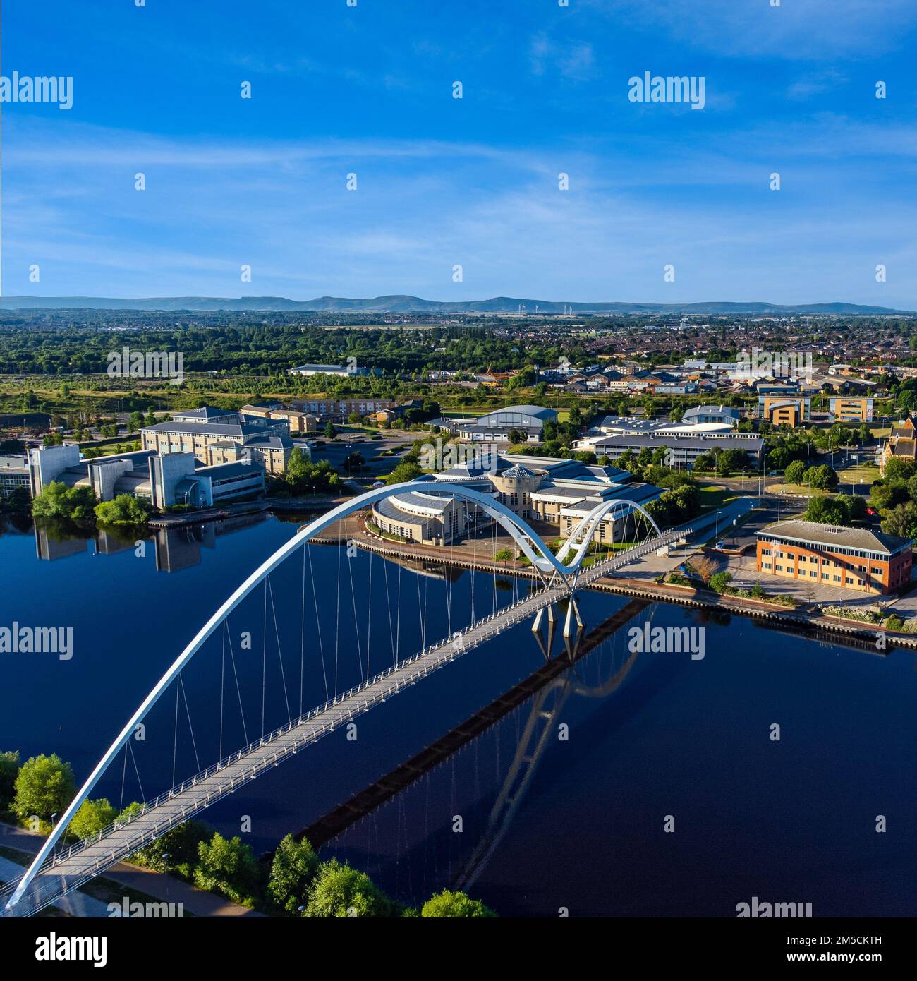 Aerial view of the Infinity Bridge spanning the river Tees located in ...