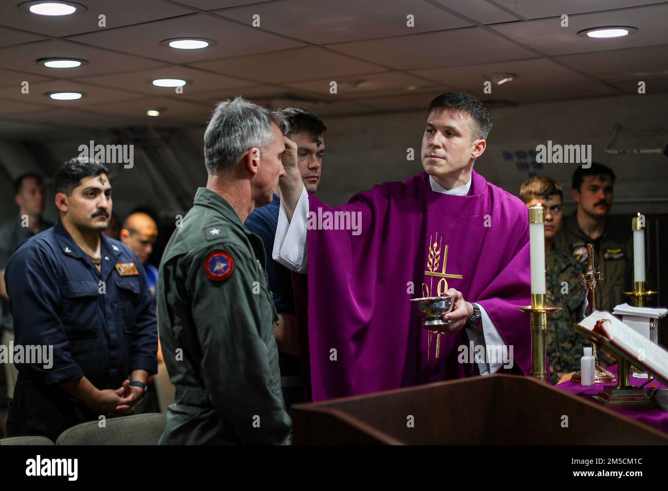 NAVAL BASE GUAM (March 2, 2022) Rear Adm. J.T. Anderson, center left, commander, Carrier Strike ...