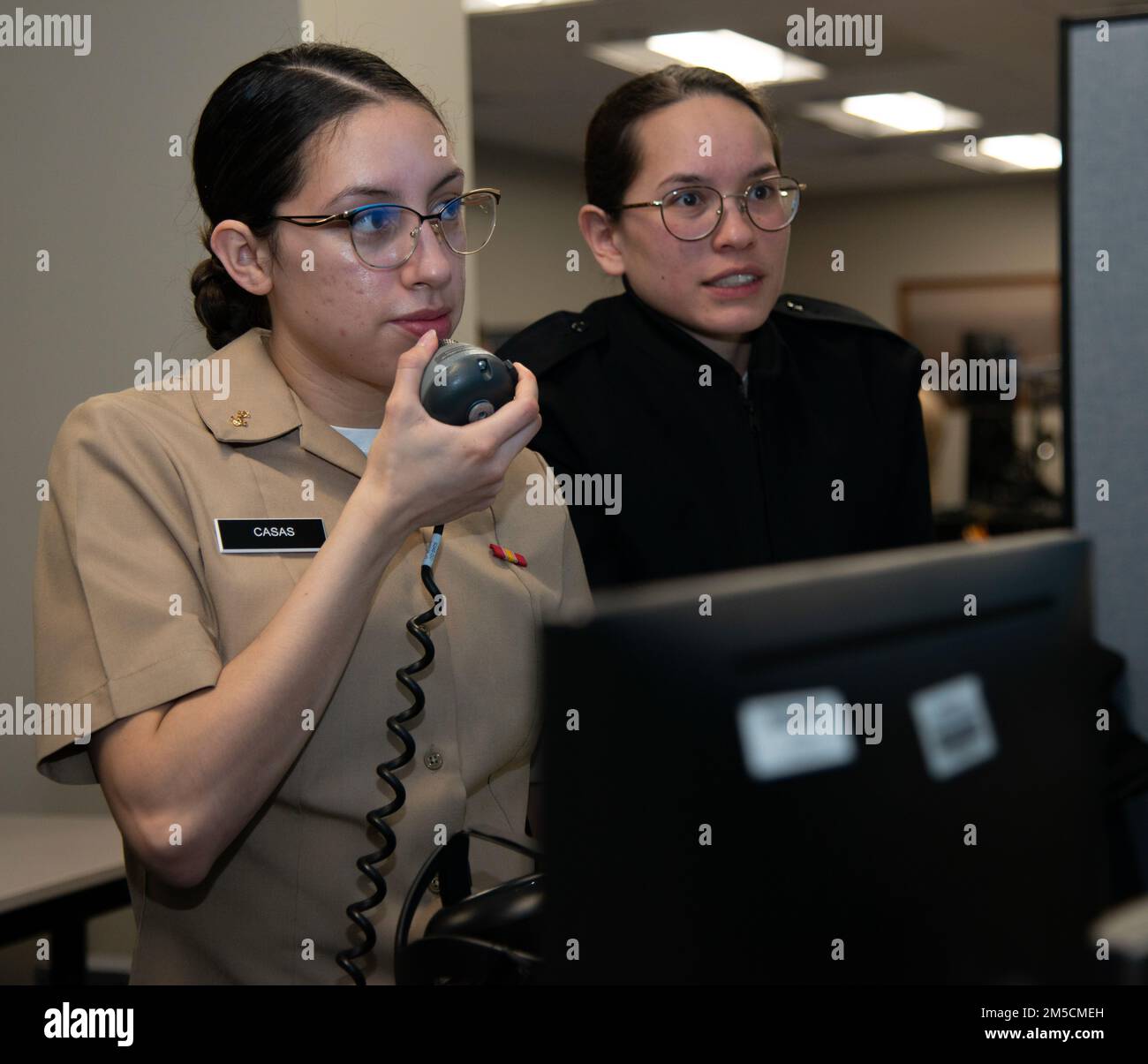 NEWPORT, R.I. (March 2, 2022) Officer Candidate Elena Casas, left, and ...