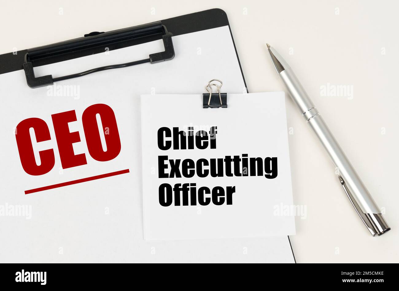 Business concept. On the tablet is a sheet of paper with the ...