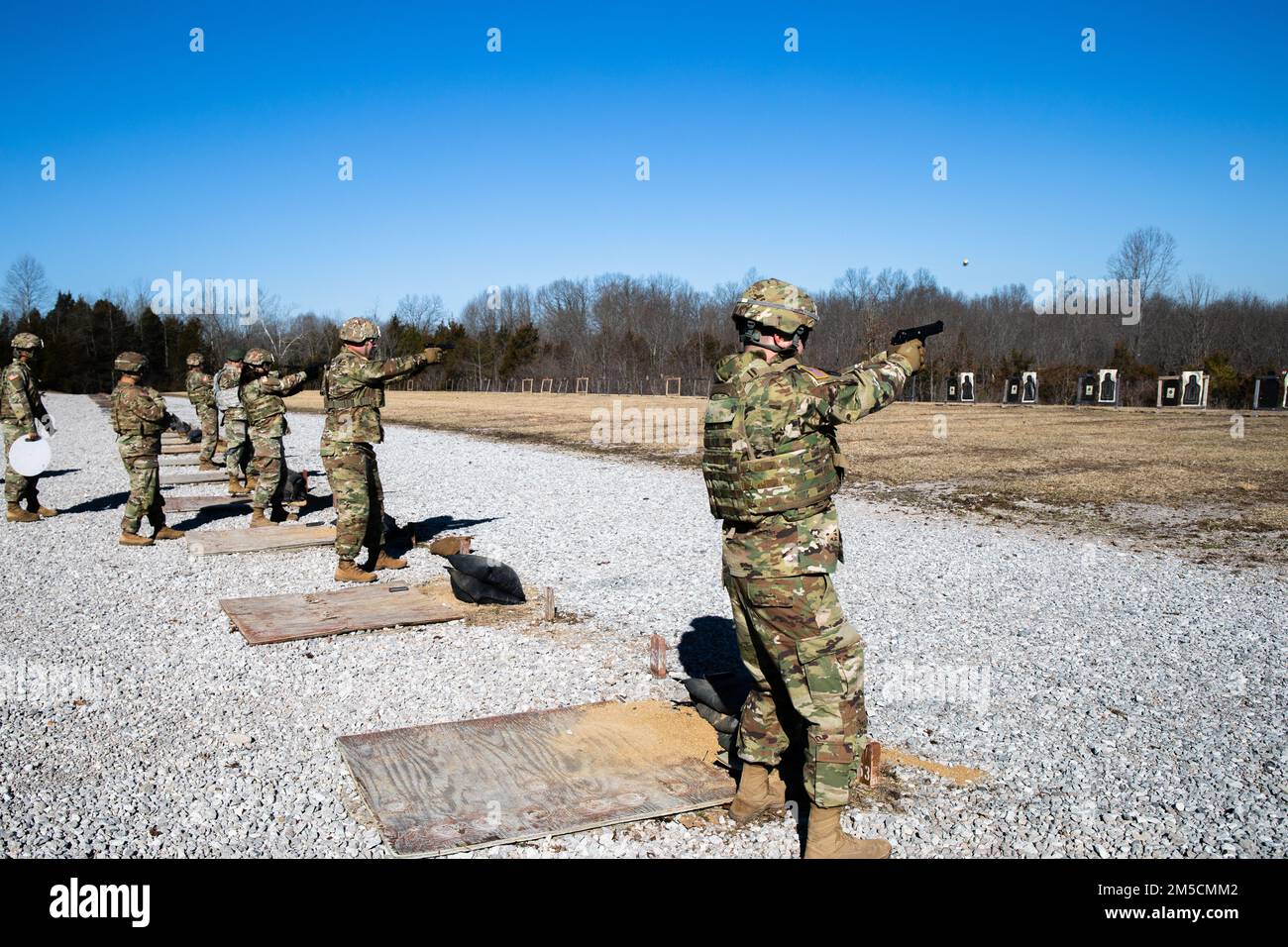 Soldiers assigned to the 1st Theater Sustainment Command, fire M-9 and ...