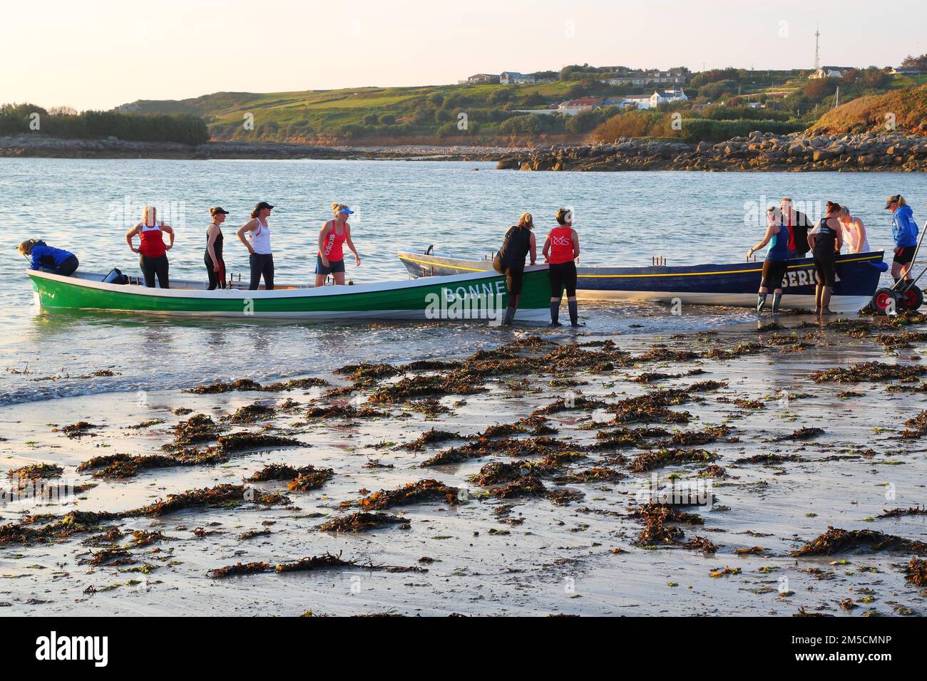 After the women's gig race the gigs are brought ashore at Porthmellon ...
