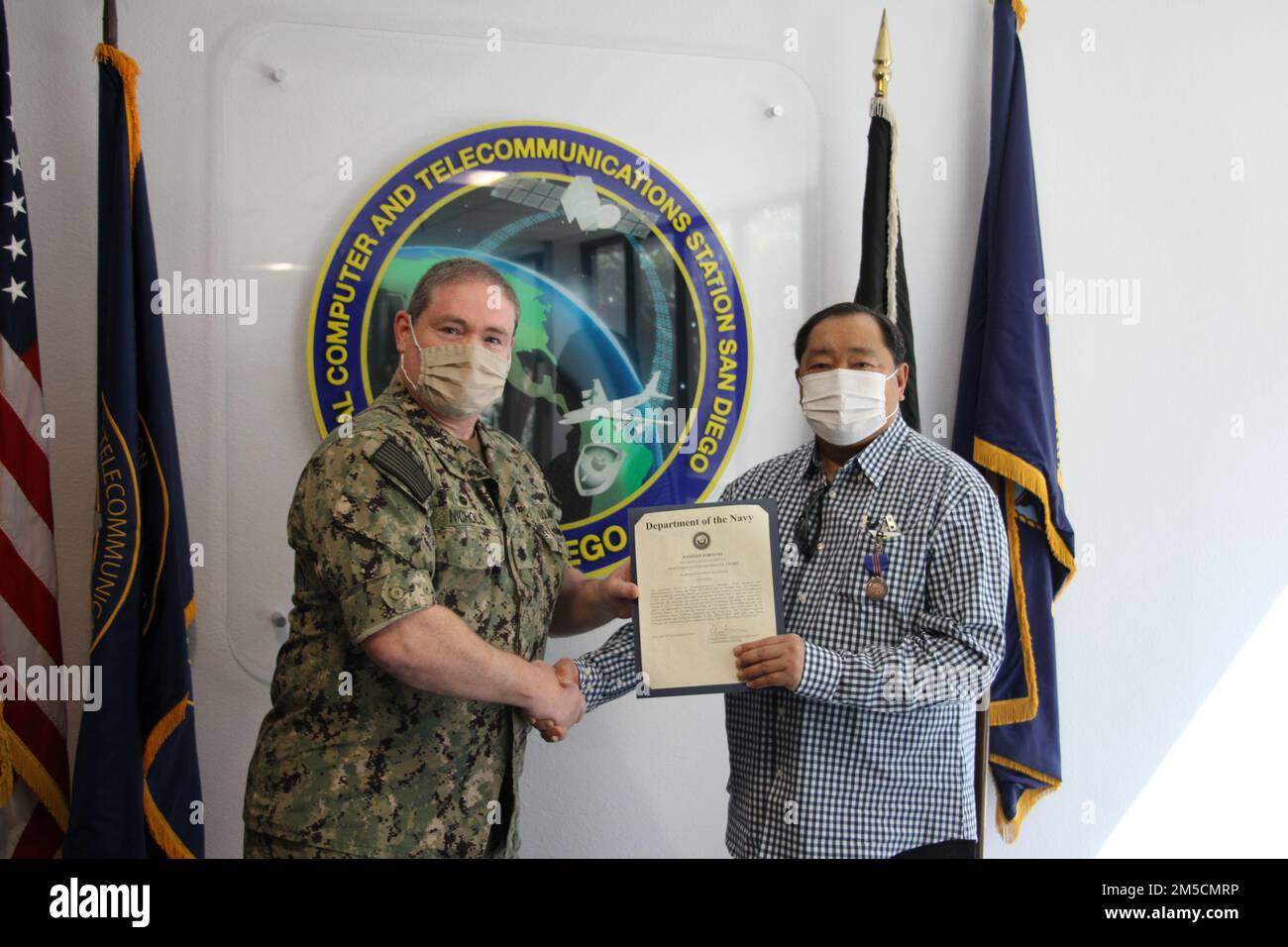 CDR Nichols awards Mr. Winston Fortuno with a Meritorious Civilian ...