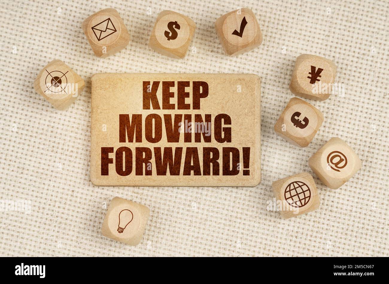 Business concept. On the fabric there are cubes with drawings and a ...