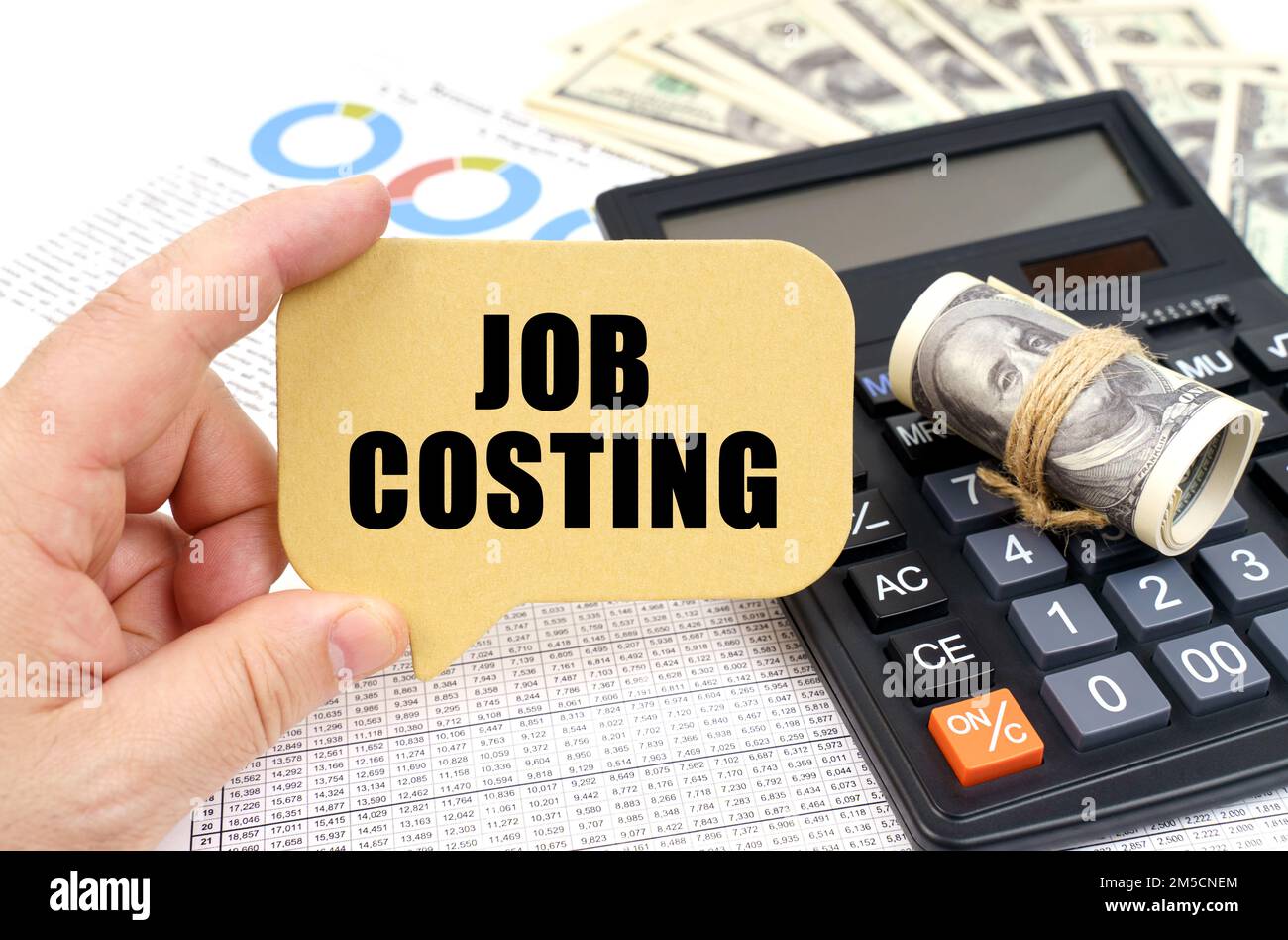 Business concept. Against the background of a calculator, documents and ...