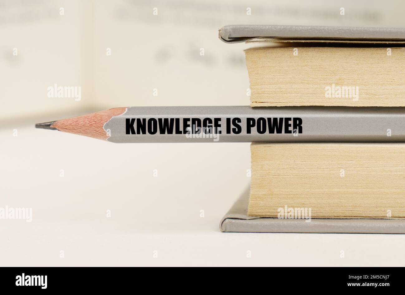 Education concept. In the book between the pages lies a pencil with the ...