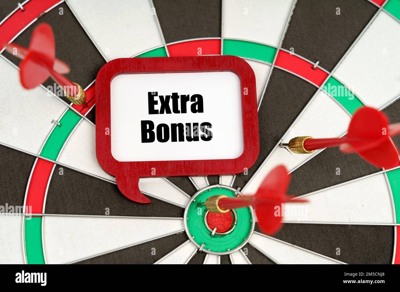 Business concept. On the darts are darts and a sign with the ...