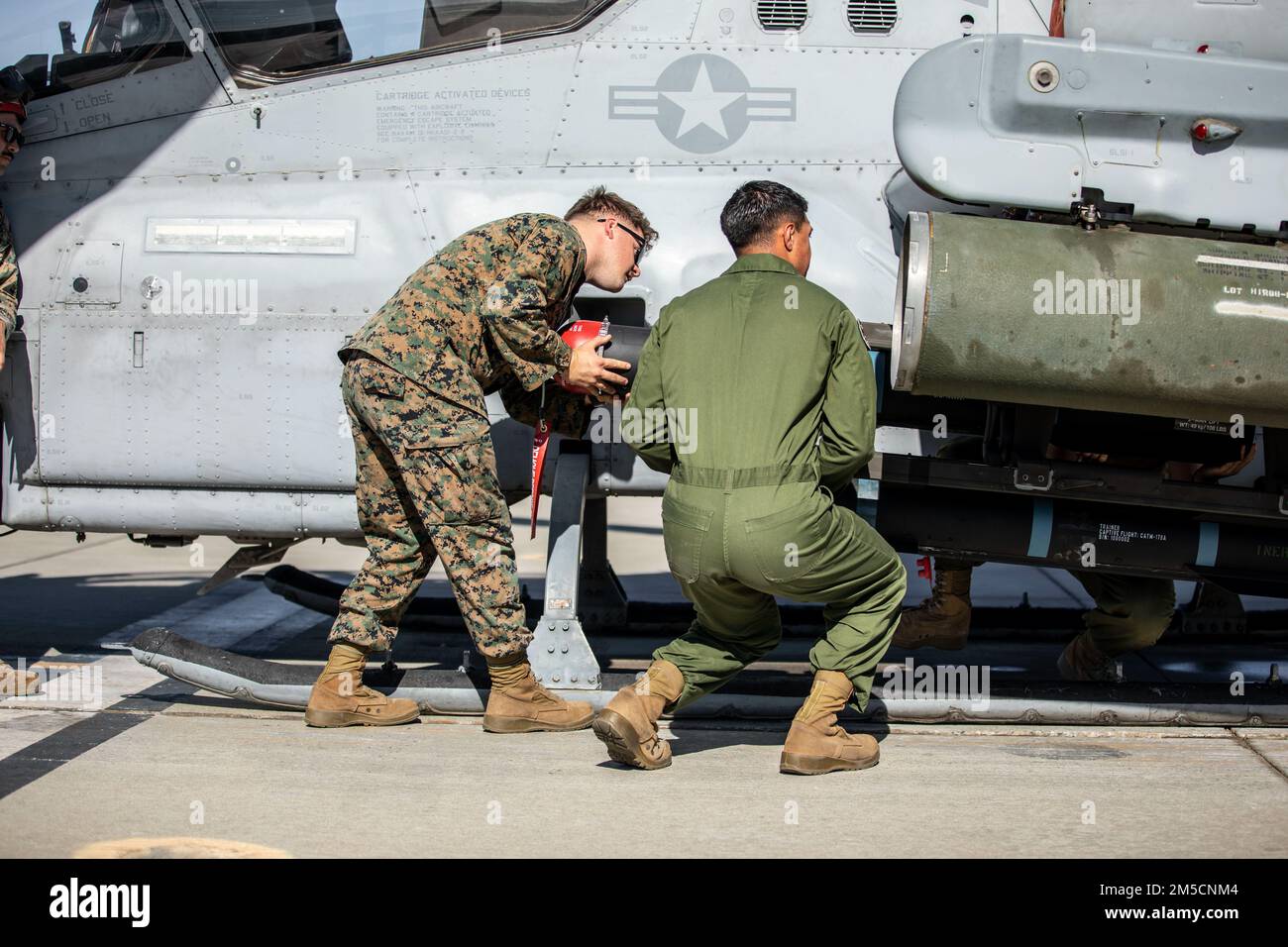 U.S. Marines with Marine Light Attack Helicopter Squadron 267, Marine ...