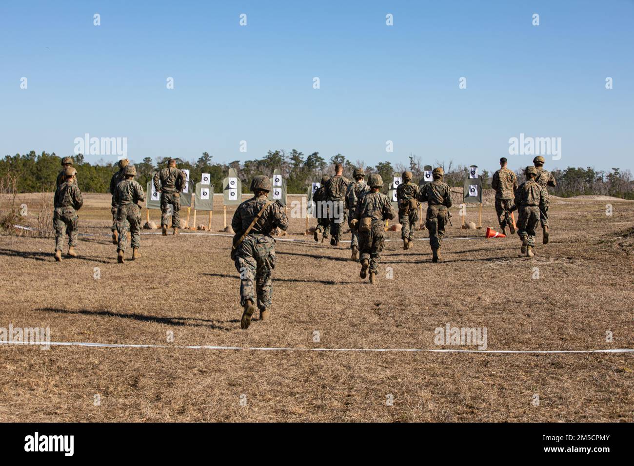 U.S. Marines with the 22nd Marine Expeditionary Unit (MEU) run towards ...