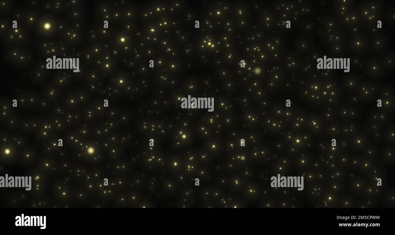 Many yellowish glowing particles moving slowly in the dark space. Bokeh ...