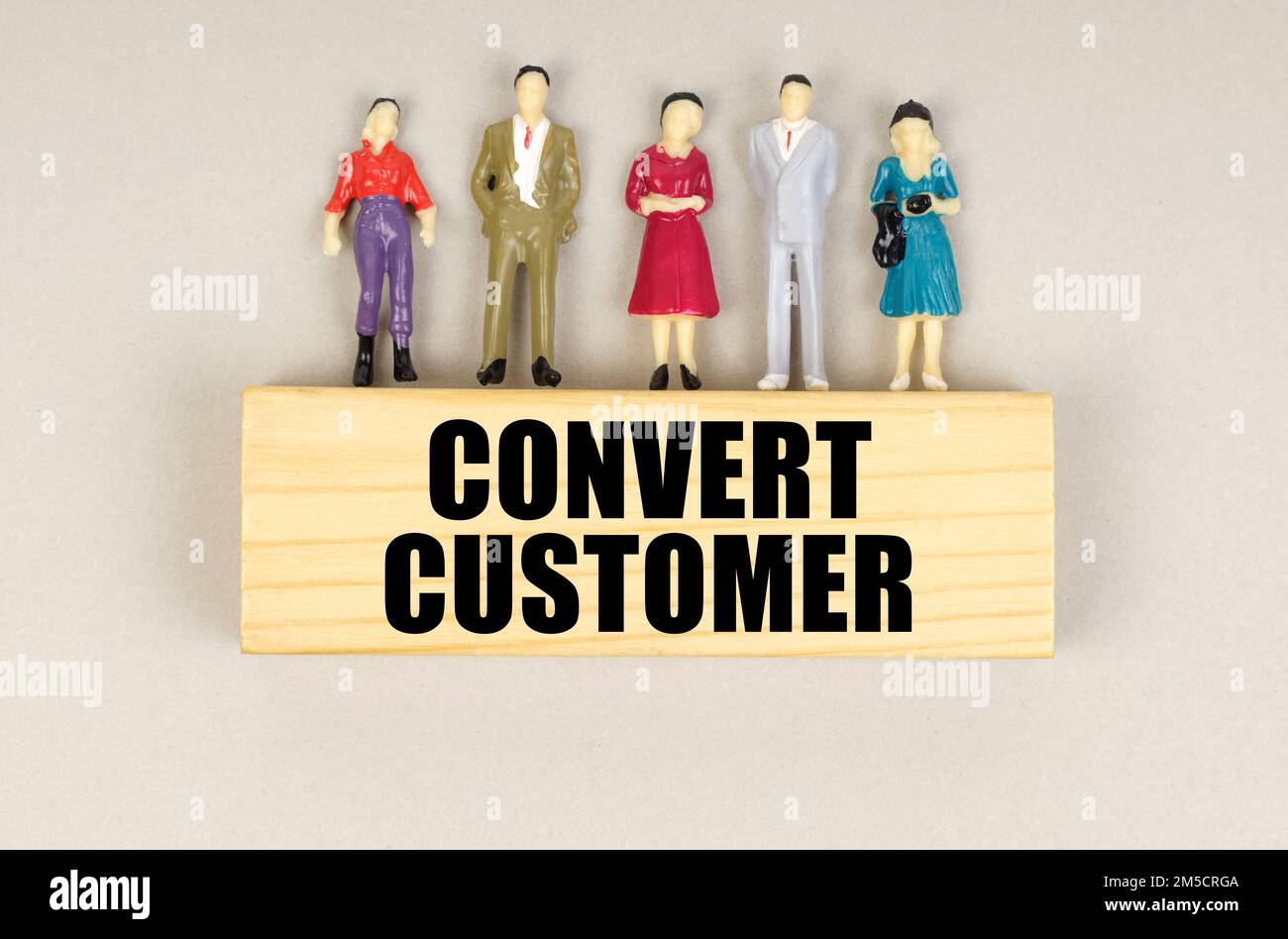 Business concept. On the block with the inscription - Convert Customer ...