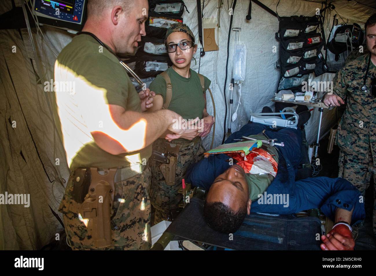 U.S. Navy hospital corpsmen and medical providers with Combat Logistics ...