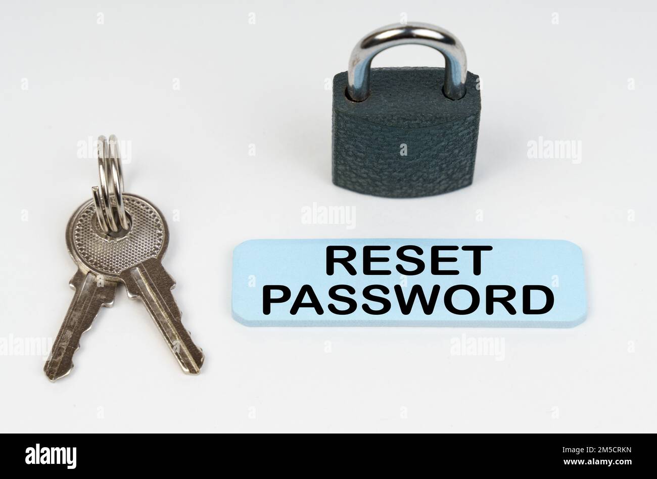 The concept of security in business. On a white surface there is a lock ...