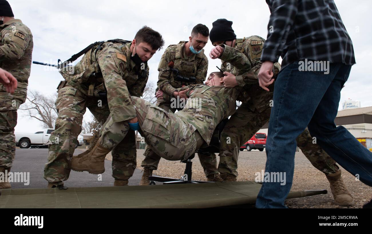 U.S. Air Force 366th Security Forces Squadron (SFS) Airmen carefully ...